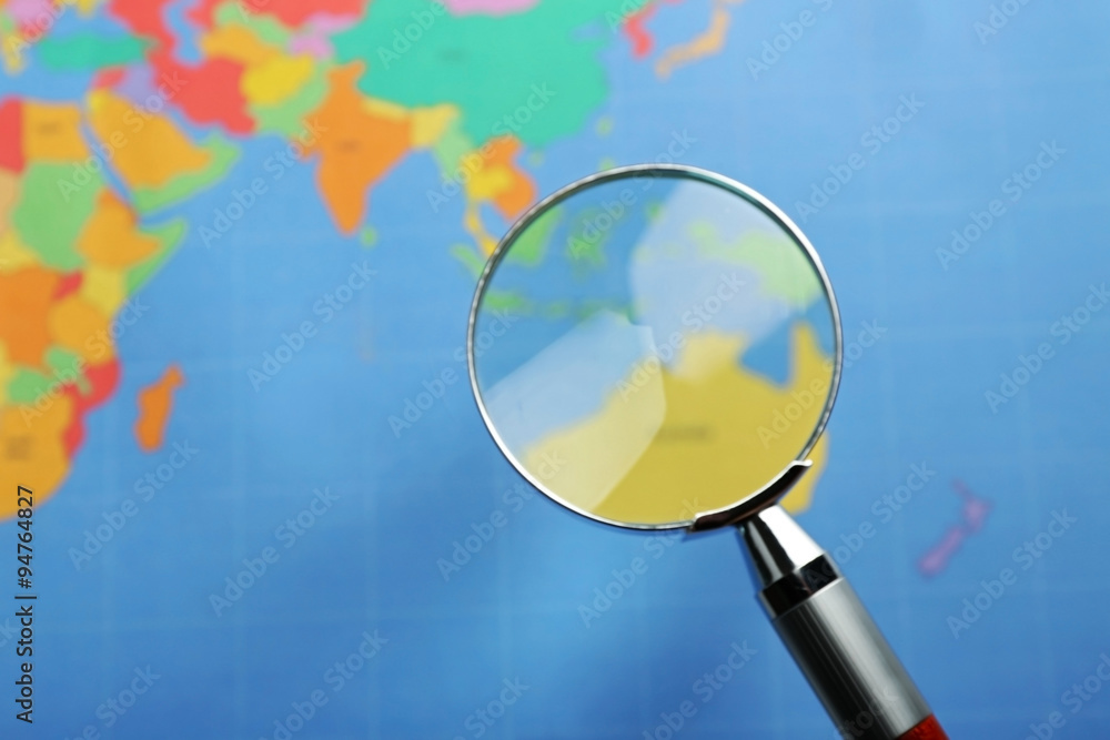 World map with magnifying glass. Worldly cuisine concept Stock Photo ...