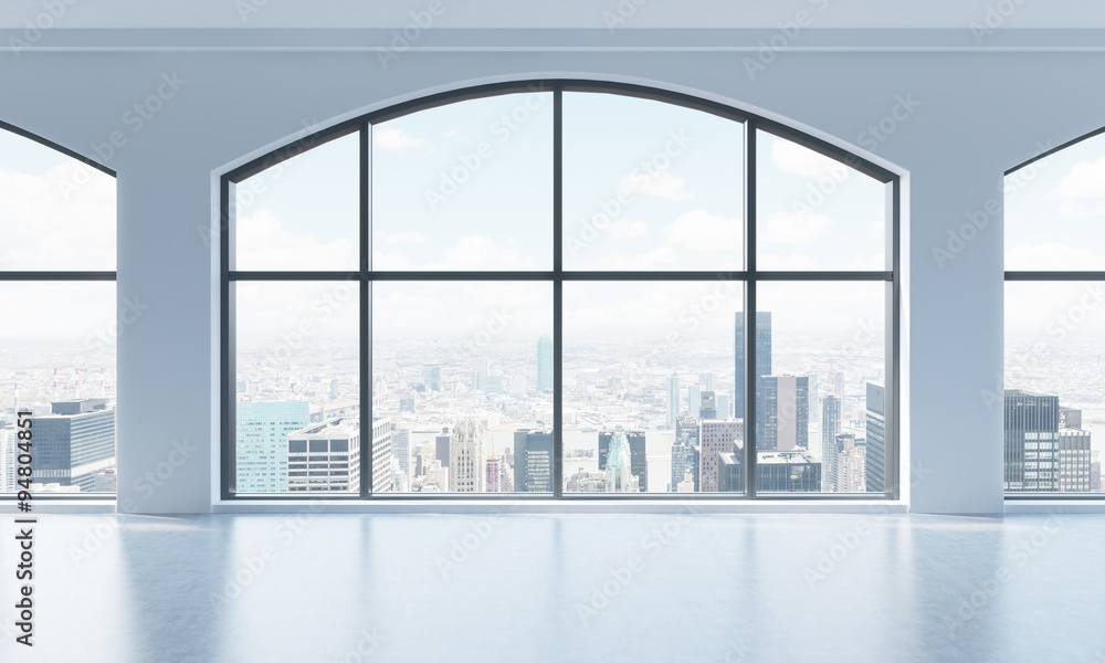 An empty modern bright and clean loft interior. Huge panoramic windows ...