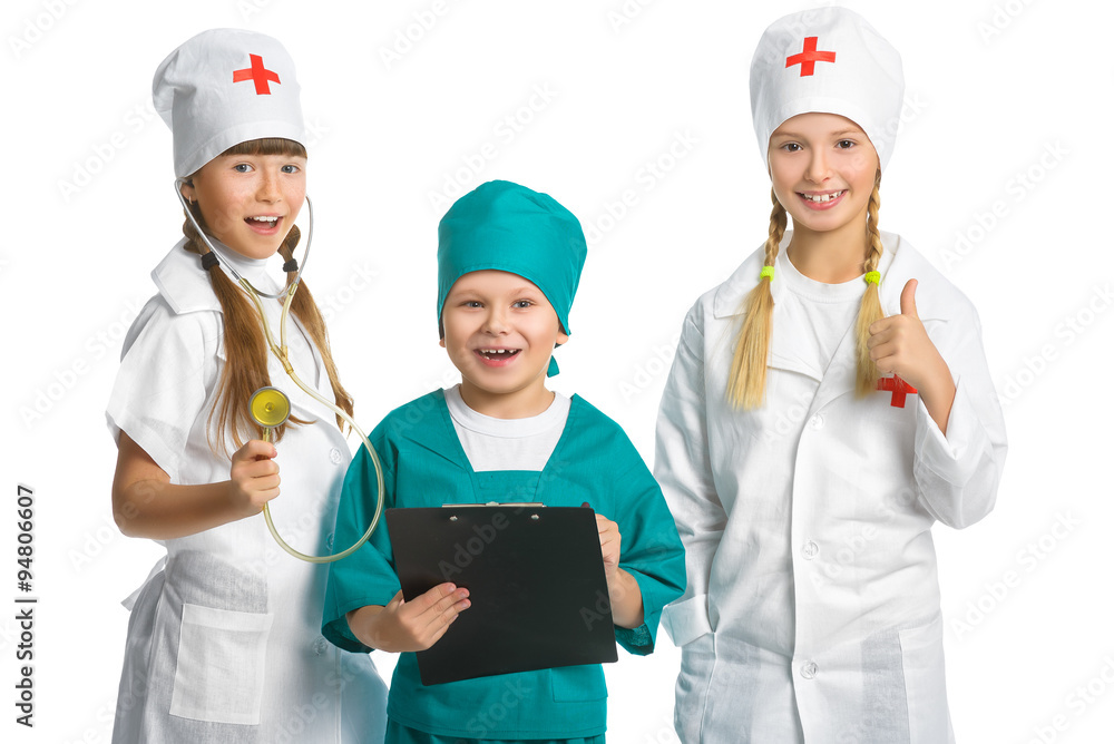 Cute little children dressed like doctor looking at camera with ...