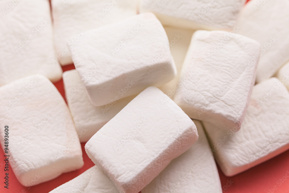 Pile of original marshmallows in red pastel background. Stock Photo ...