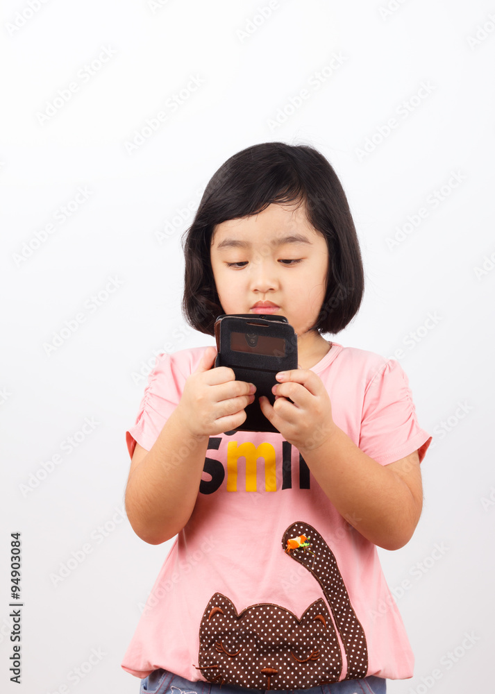 Little Asian child using her smart phone with happy face Stock-Foto ...