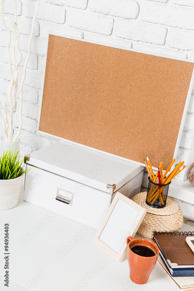 Working desk, laptop, cork board. Office interior Stock Photo | Adobe Stock