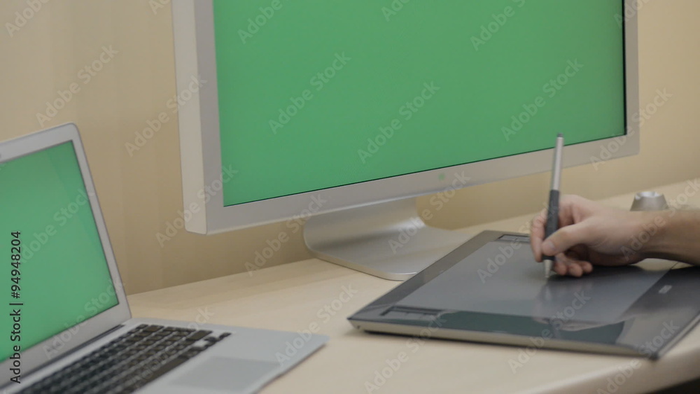 Designing at Wood Desk at computer and Modern devices Dual Monitor ...