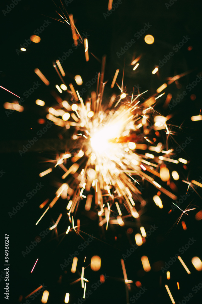 sparkler on a dark background Stock Photo | Adobe Stock