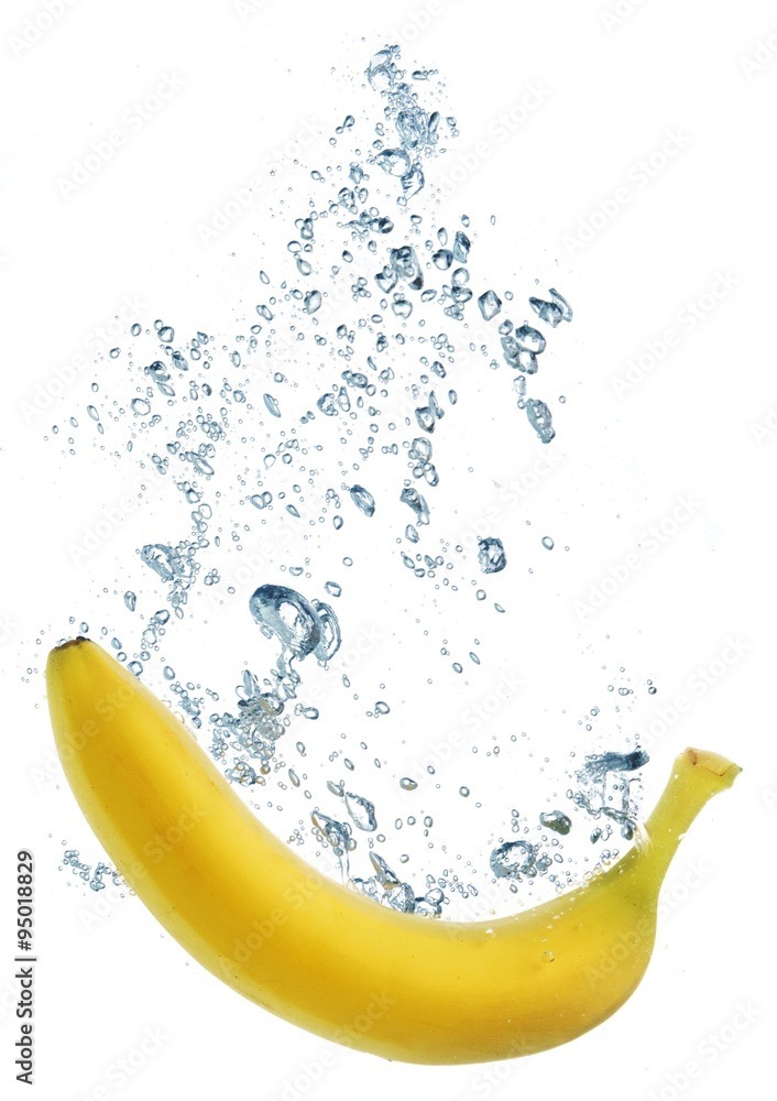 A background of bubbles forming in water after yellow banana are dropped into it. Stock Photo ...
