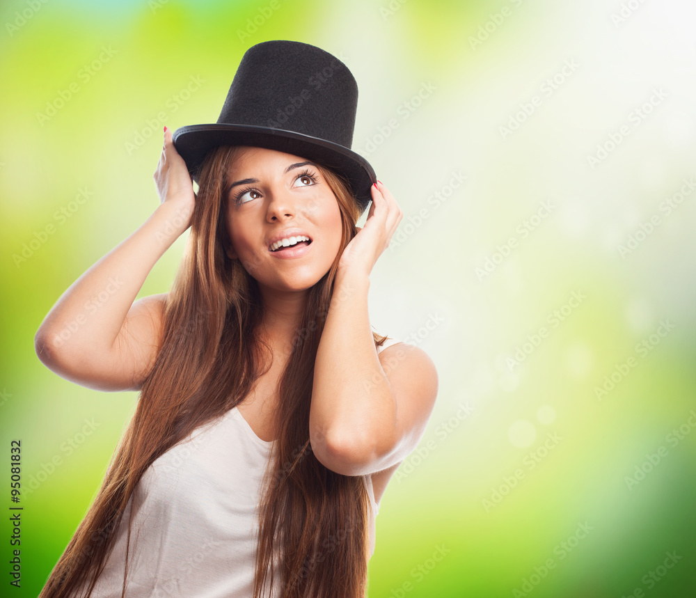 pretty girl wearing a vintage top-hat and thinking about somethi Stock ...