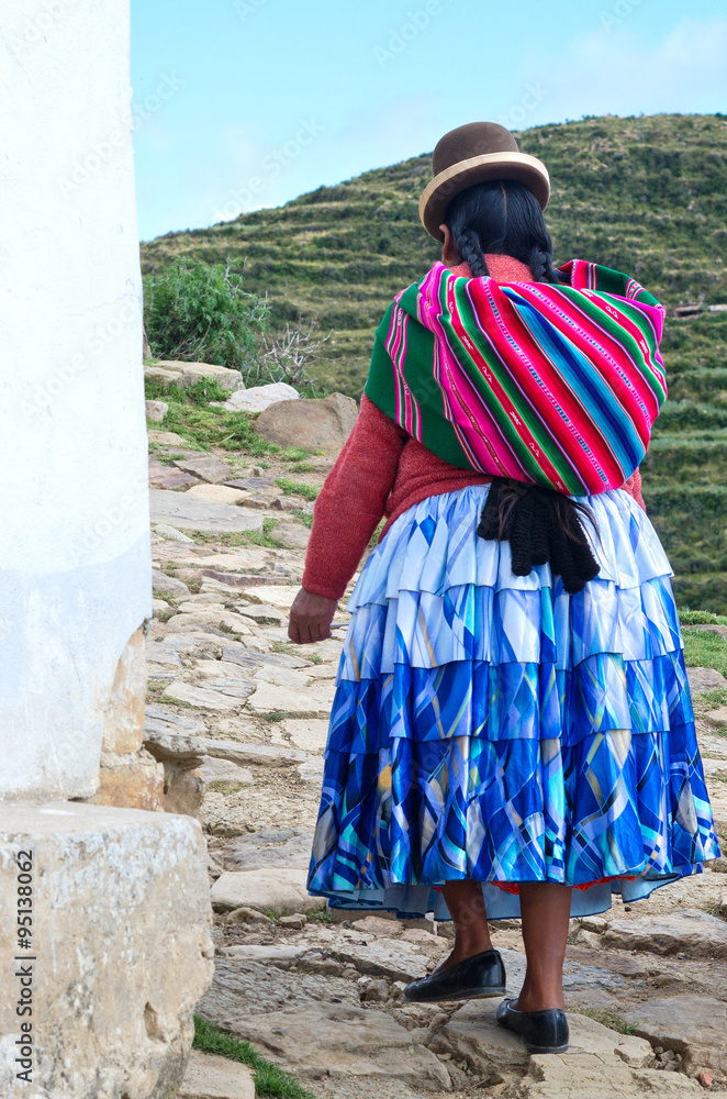 Bolivian women in traditional clothes on the street .Island of the Sun ...