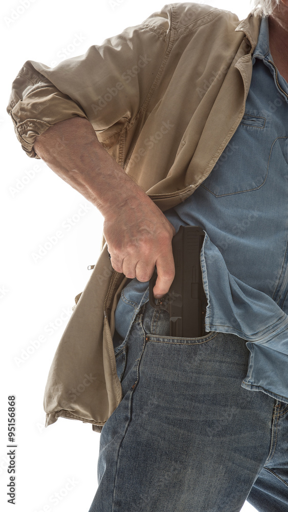 Man pulls a gun out of his pocket Stock Photo | Adobe Stock