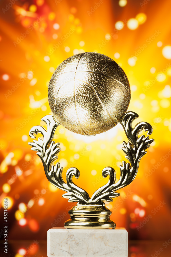 basketball trophy against shiny sparks background Stock Photo | Adobe Stock