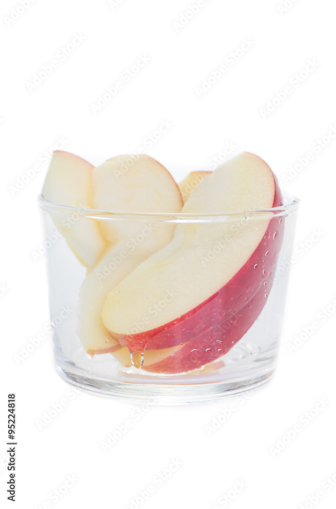 Fresh apple slice in glass cup isolated on white background Stock Photo ...