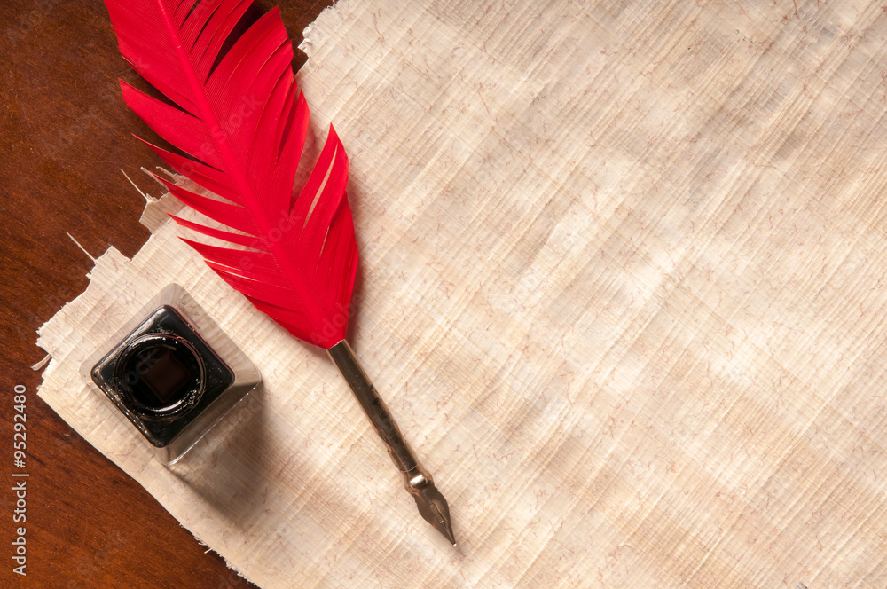 Red quill pen and black inkwell on a papyrus sheet Stock Photo | Adobe ...
