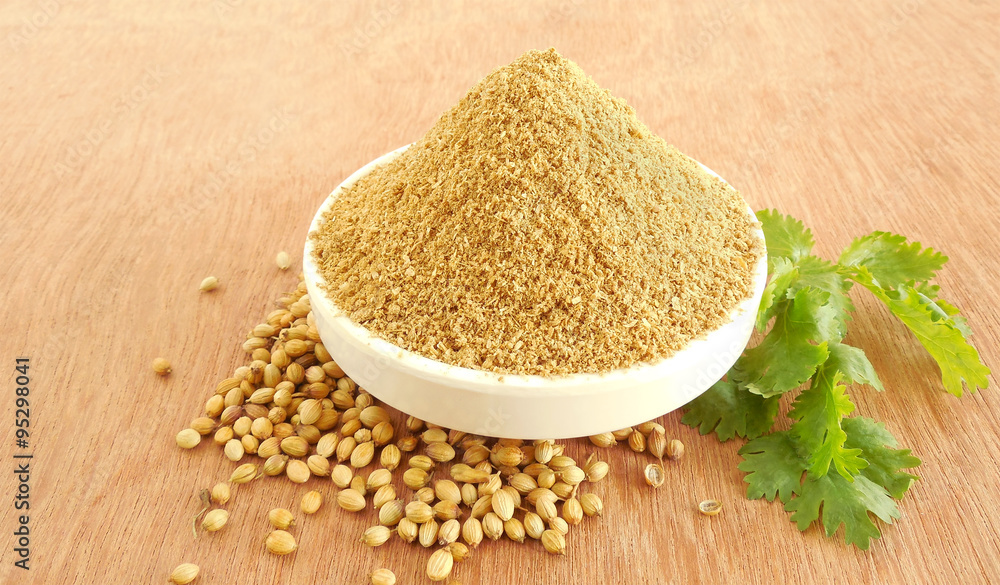 Coriander powder, which is used as an ingredient in some dishes. Stock ...