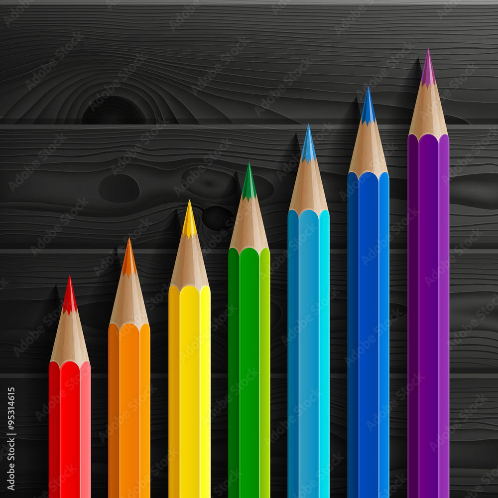 Infographic rainbow colored pencils diagonal growth chart on black wooden texture background ...