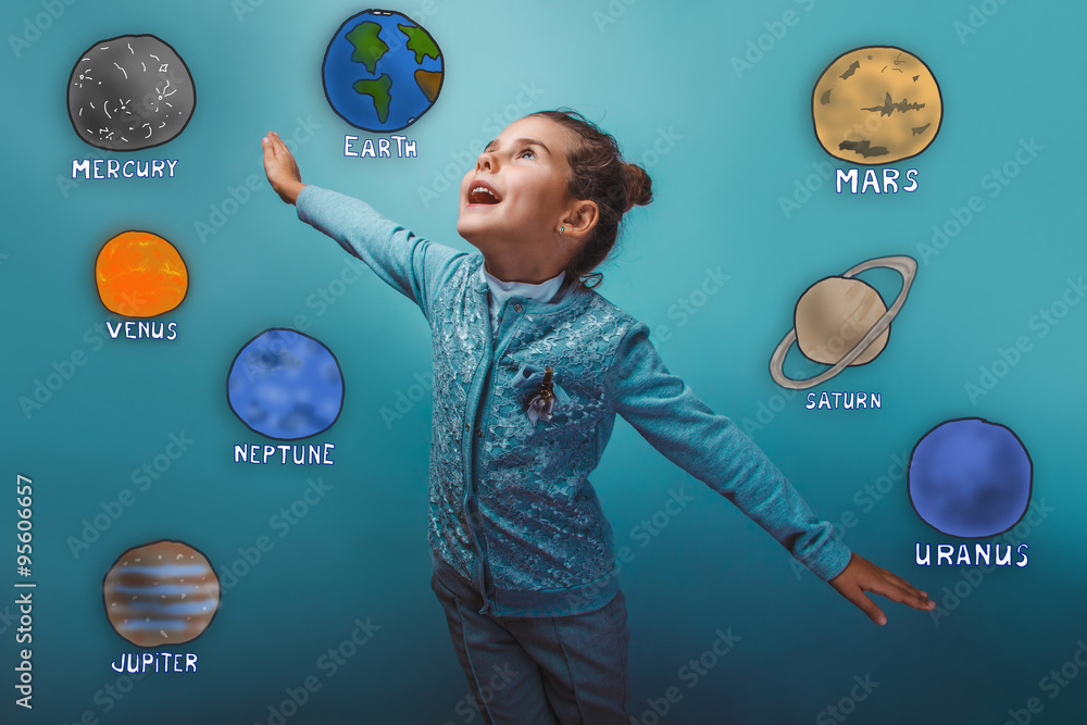 Teen girl shows a happy flight of planets in the solar system as Stock ...