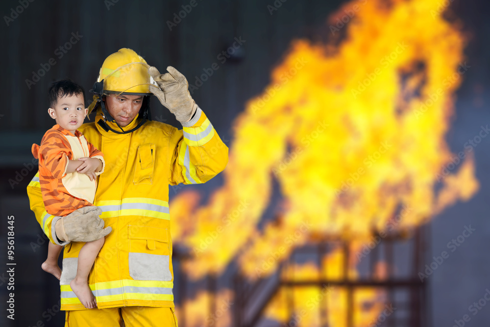 firefighter, fireman rescued the child from the fire Stock Photo ...
