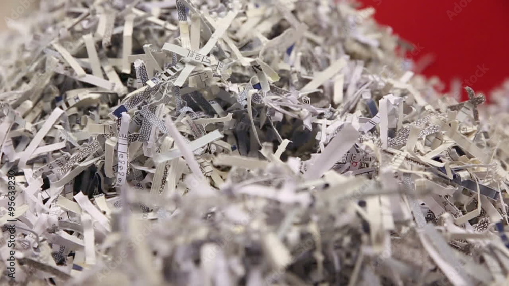 Shredded Paper Slow Zoom In. camera slowly moves in on a stack of ...