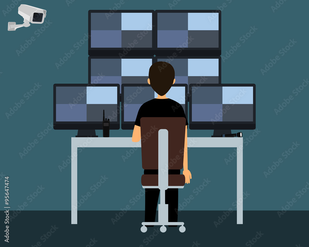 Workplace security guard. The security guard watching a video from ...