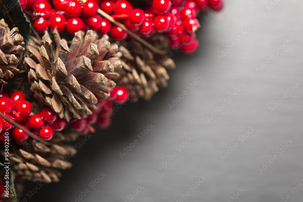Pine cones and red holly berries Stock Photo | Adobe Stock
