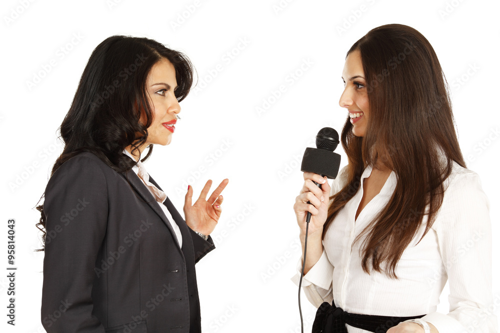 Series of shots of a woman with a microphone interviewing another woman ...