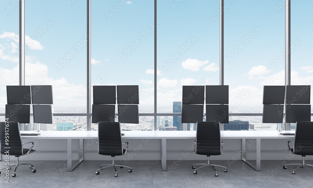 A modern trader's workplaces in a bright modern open space office ...
