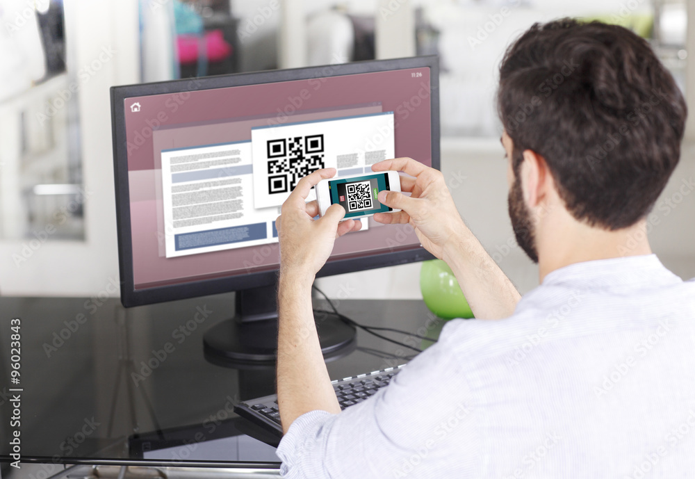 Scanning QR code Stock Photo | Adobe Stock