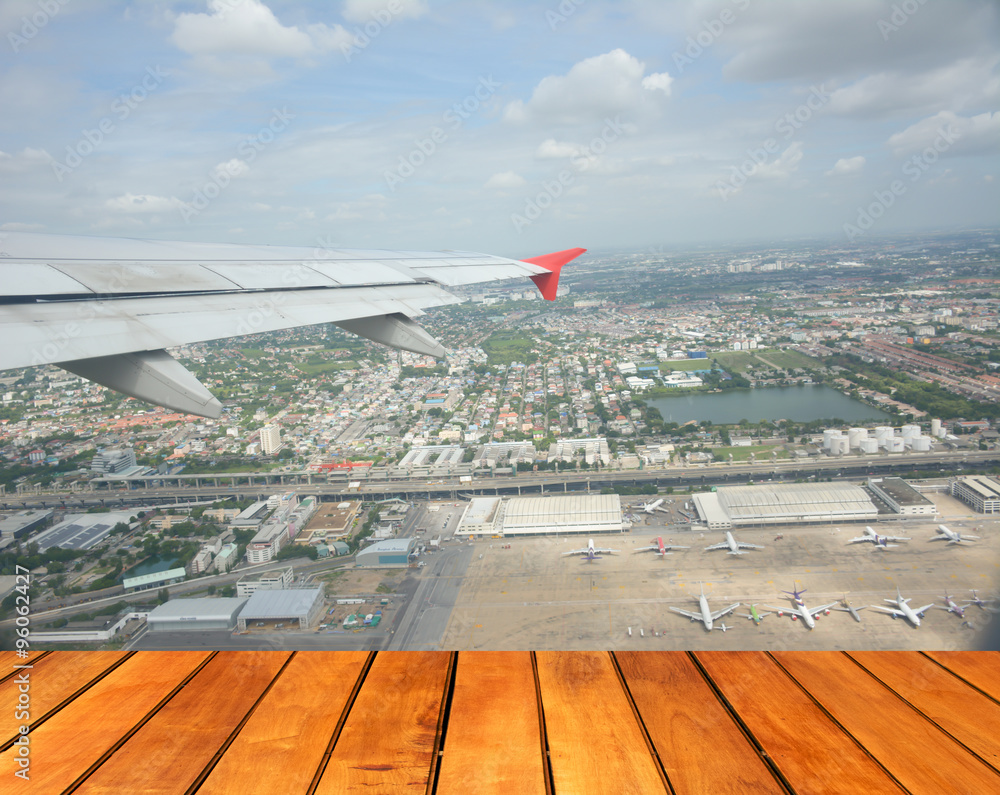 Wooden table with airport as seen through window of an aircraft Stock ...