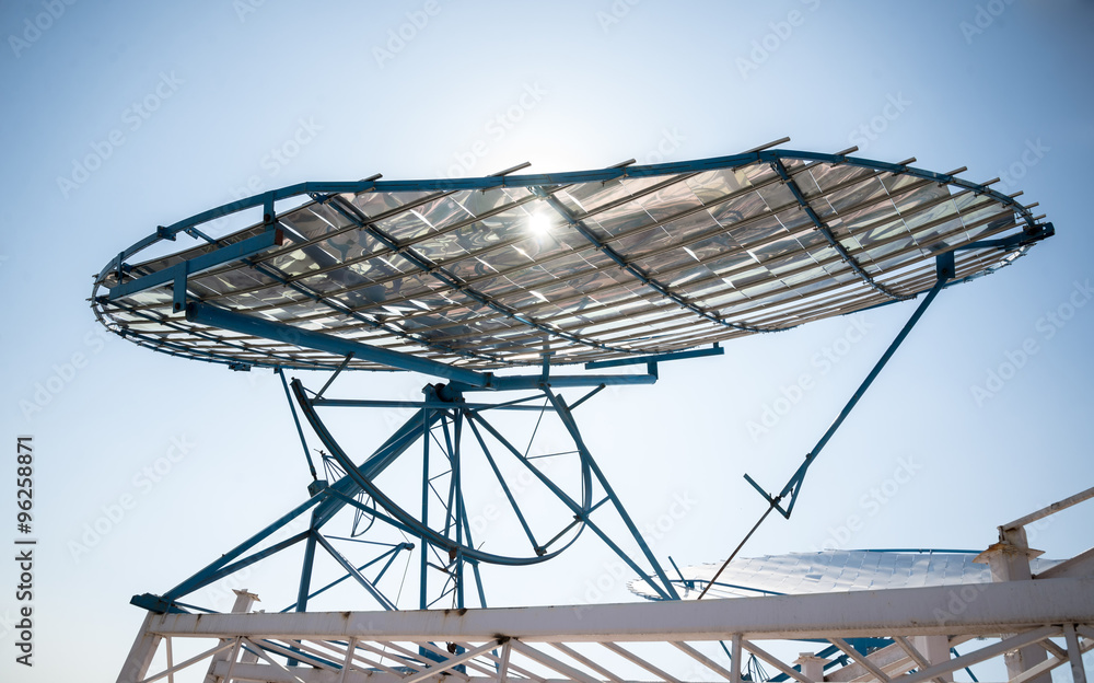 Solar Thermal parabolic reflectors at a rooftop plant being used to ...