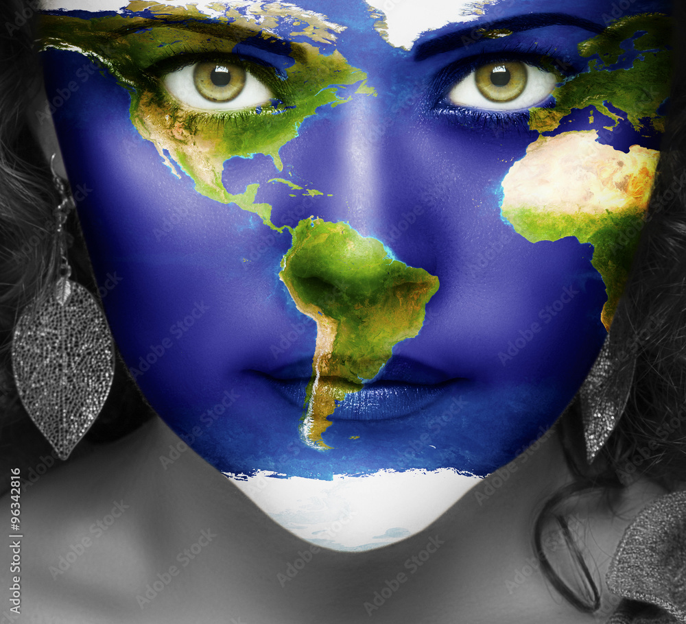 Map of the world on face of girl with green eyes Stock Photo | Adobe Stock