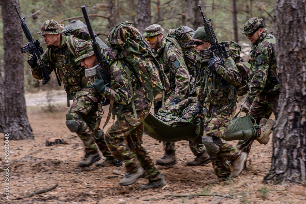 Military medical evacuation of wounded soldier Stock Photo | Adobe Stock