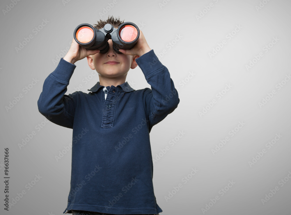 little kid using binoculars Stock 写真 | Adobe Stock