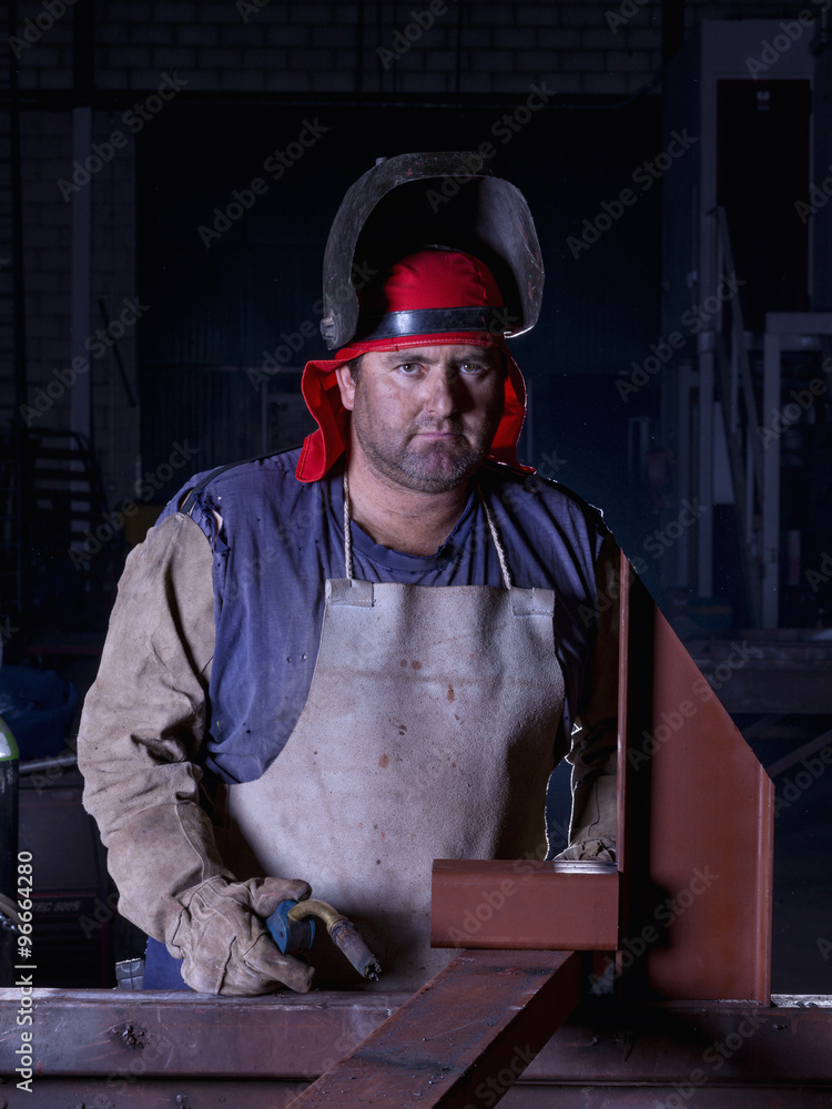 Portrait of a welder at his workplace Stock Photo | Adobe Stock