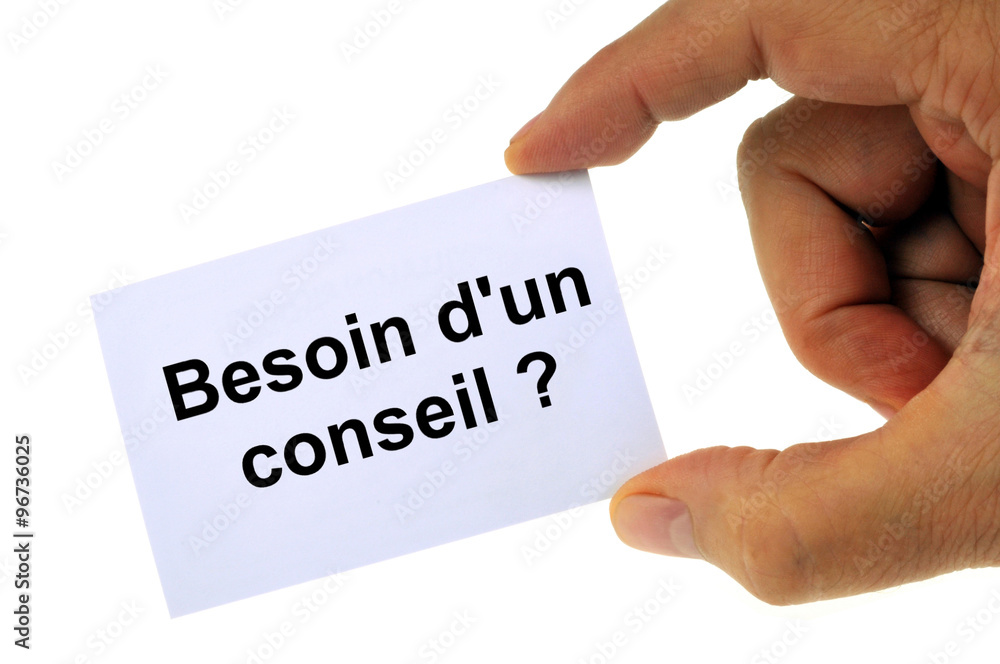 Besoin d'un conseil écrit sur une petite carte tenue en main Stock ...