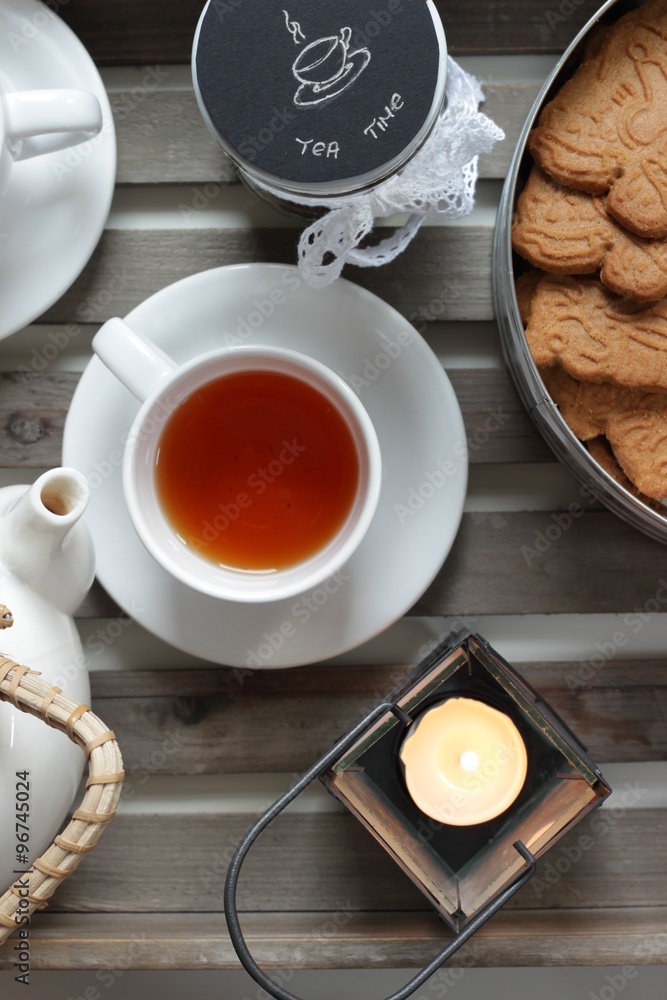 Table layout for tea with candle Stock Photo | Adobe Stock