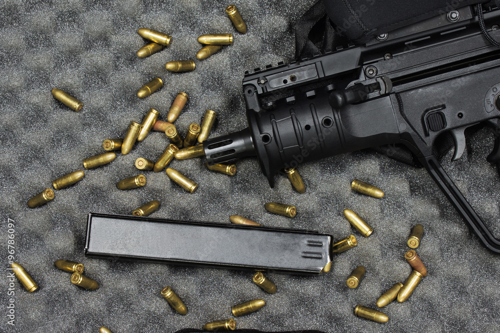 Fotografia do Stock: ammunition (bullets) and gun with the weapon ...