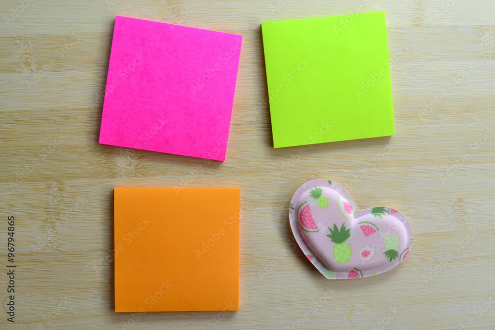 Colorful post it note and heart shape on wooden board Stock Photo ...