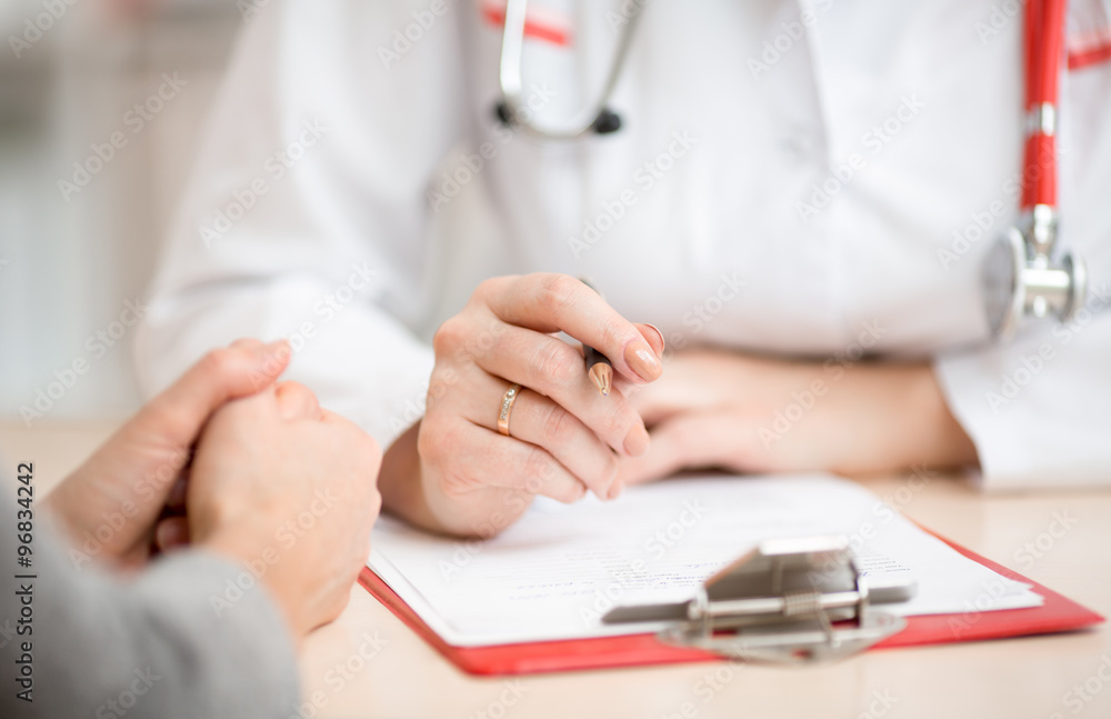 Doctor's desk during patient's consultation in clinic Stock Photo ...