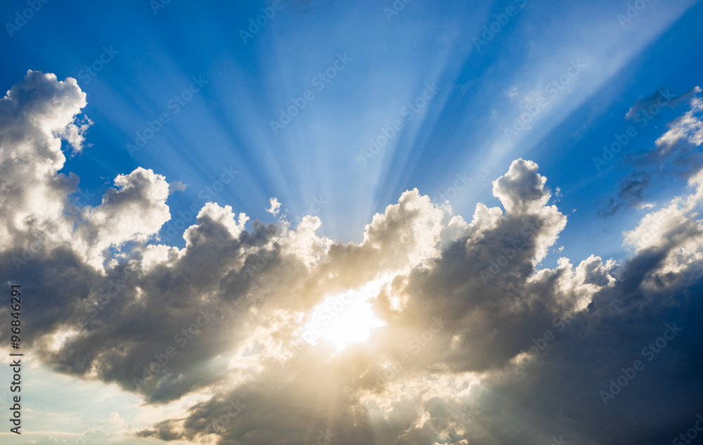 Sunbeams breaking through clouds Stock Photo | Adobe Stock