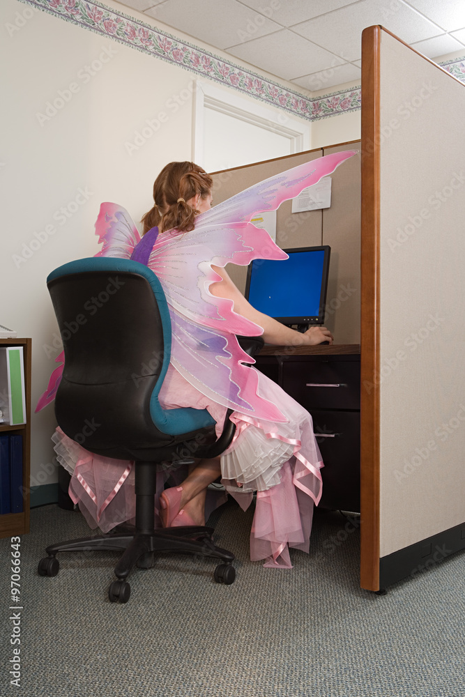Office worker dressed as a fairy Stock Photo | Adobe Stock
