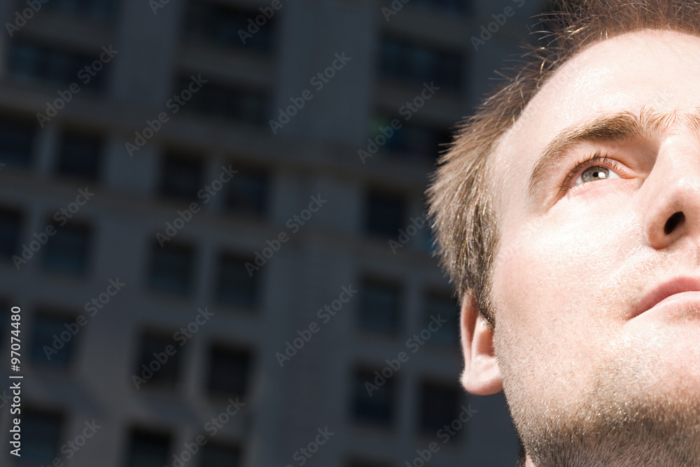 Man looking up Stock Photo | Adobe Stock