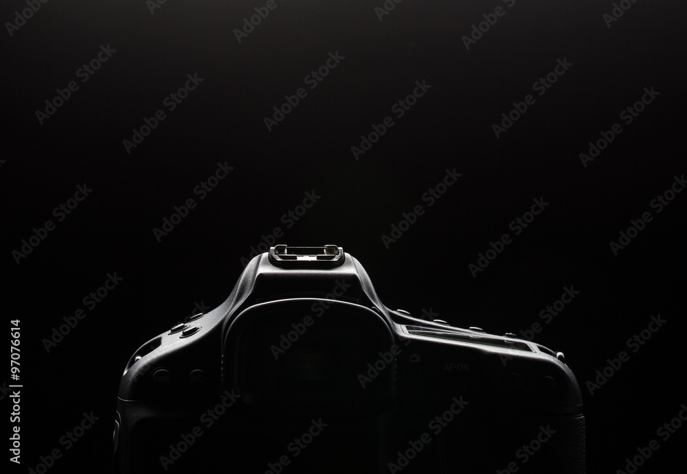 Professional modern DSLR camera low key image Stock Photo | Adobe Stock