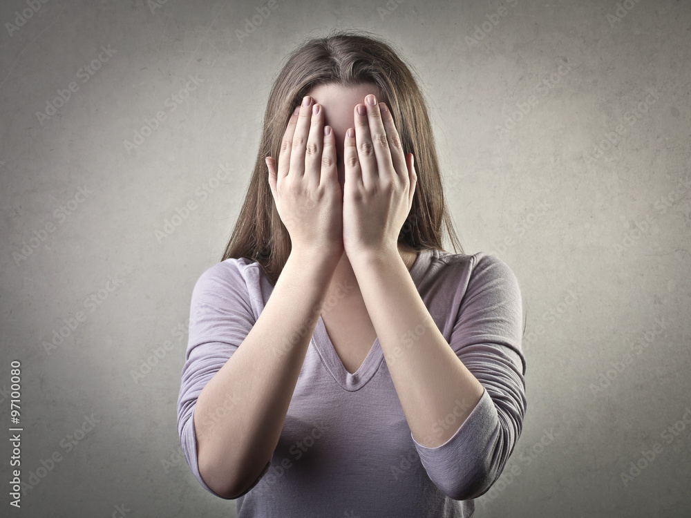 Foto Stock Ashamed woman | Adobe Stock