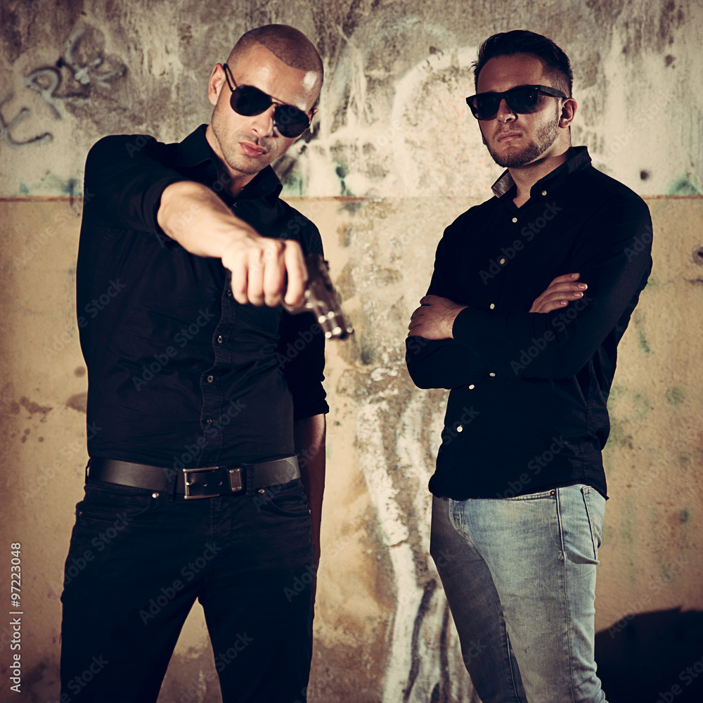 Bodyguard protecting a boss on location Stock Photo | Adobe Stock