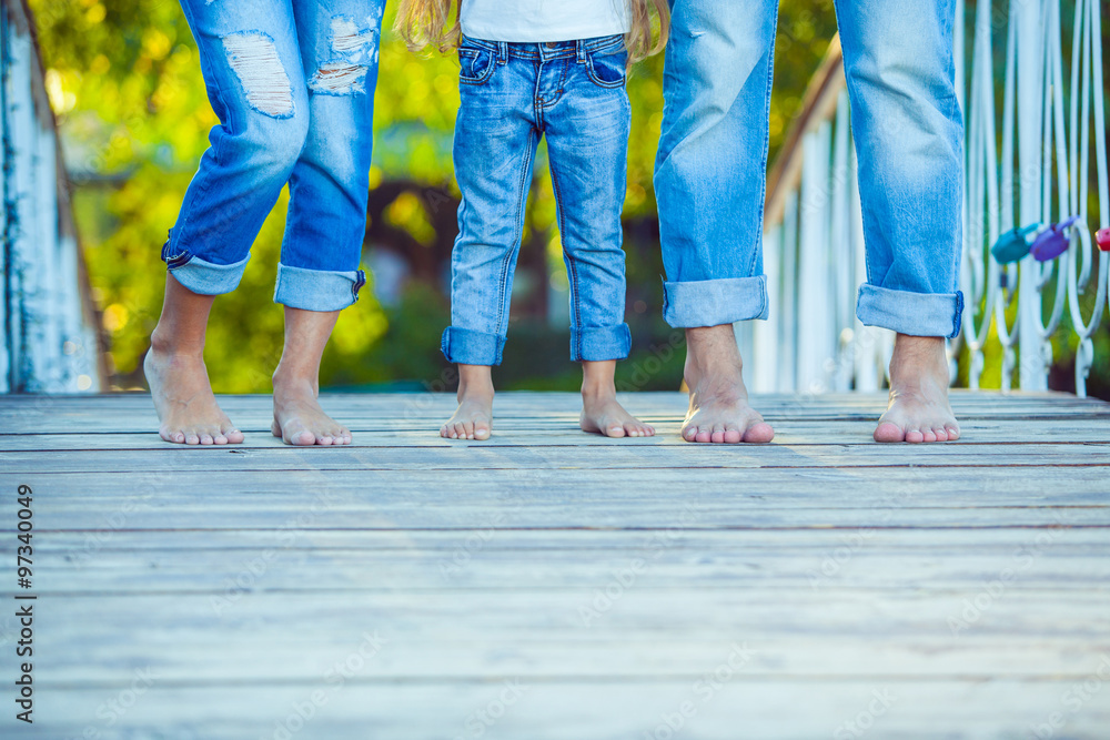Happy Family on a Walk in Summer. Child with Parents Together. Feet ...