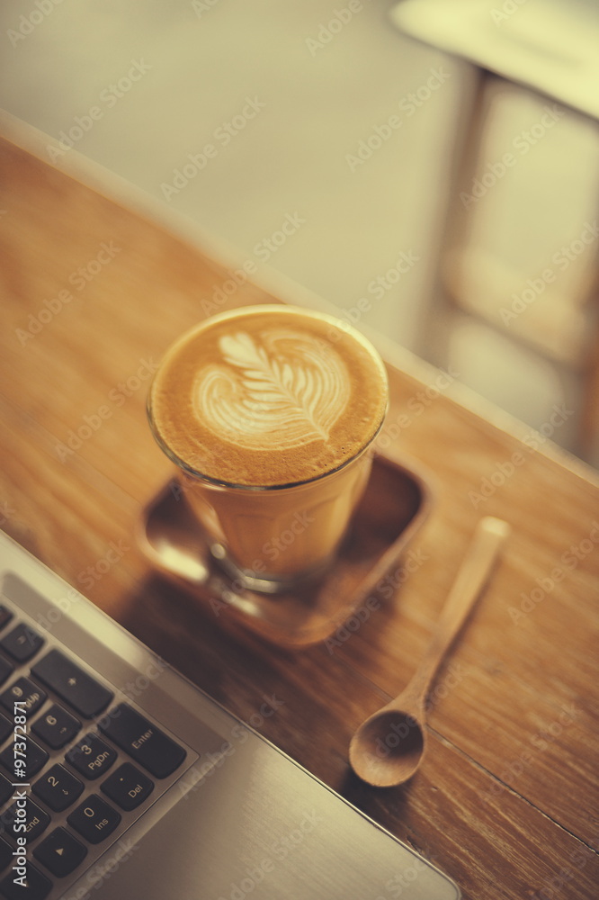 cup of coffee latte on the wood texture in vintage color tone Stock ...