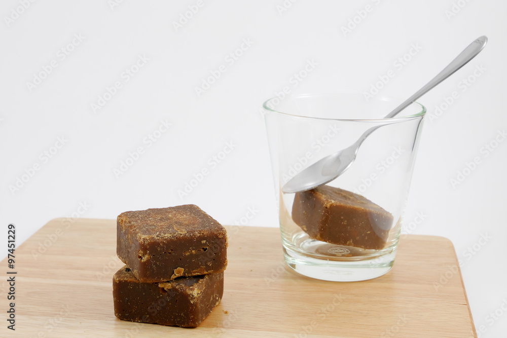 The Taiwan brown sugar ginger tea cubes on the wooden board. Stock ...