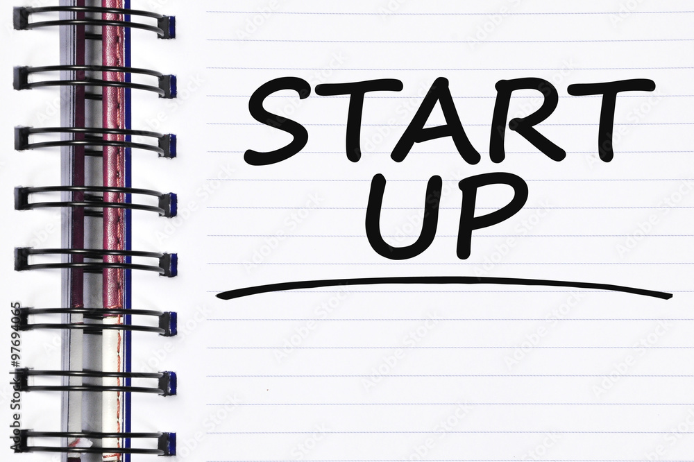 start up words on spring white note book Stock Photo | Adobe Stock