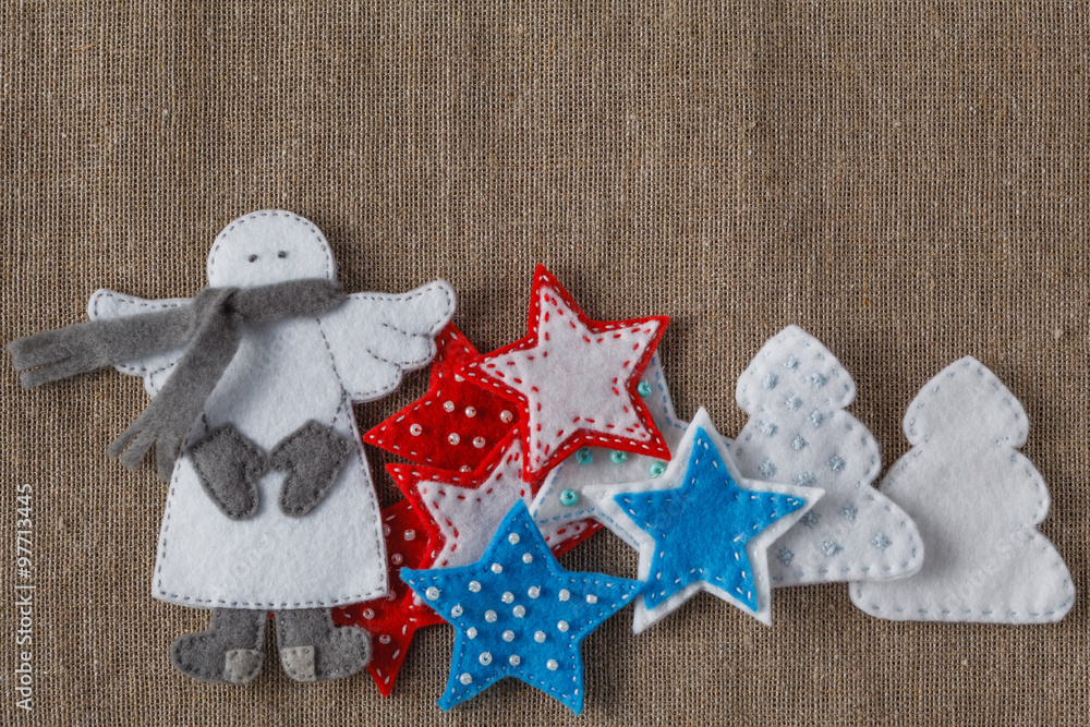 Flat felt figures on coarse woven Stock Photo | Adobe Stock