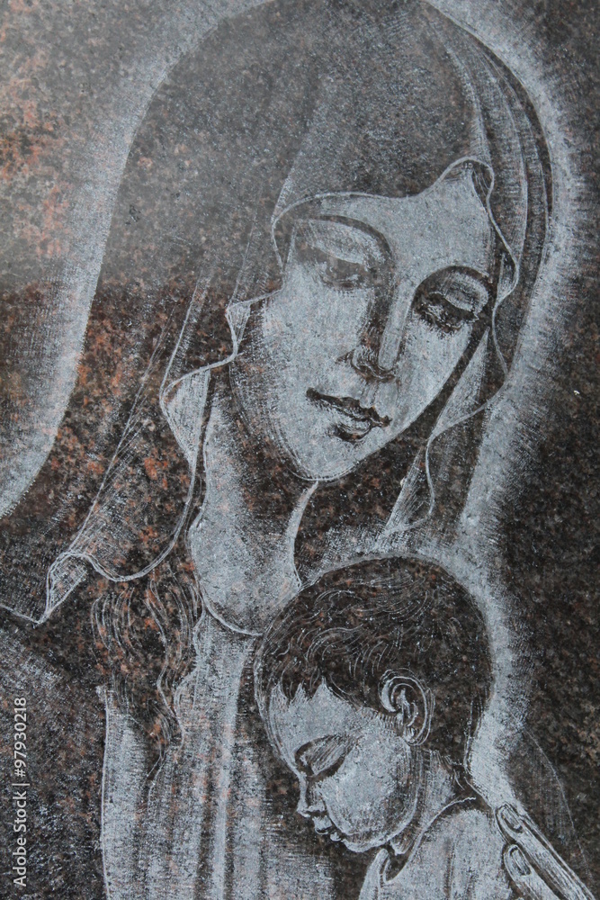 Maria mit Christuskind auf einem Grabstein Stock Photo | Adobe Stock