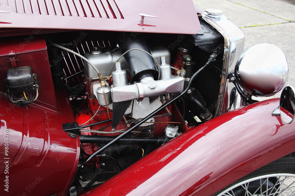 Old red vintage classic collectors car engine that has been restored ...