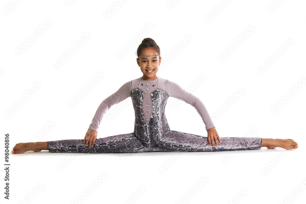 little girl doing gymnastics. transverse split sitting on the floor ...